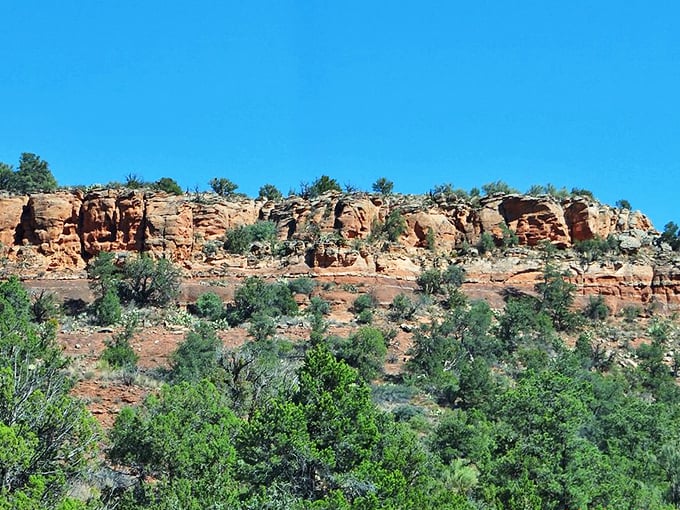 Standing proud against an impossibly blue sky, these ancient formations look like nature's own cathedral spires.