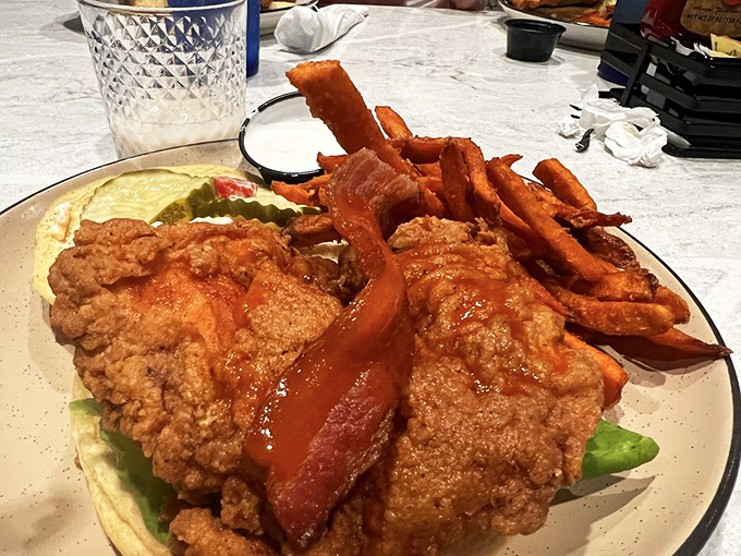 A golden-brown masterpiece that puts ordinary fish and chips to shame. It's comfort food with a coastal twist that'll have you hooked. Photo credit: Denise A.
