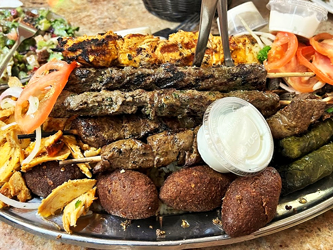 Behold, the Mount Everest of mezze! This platter is a culinary expedition that'll take your taste buds from sea level to flavor summit in one bite.