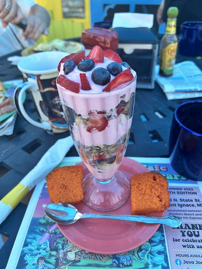 Layer upon layer of breakfast bliss! This parfait is like a sunrise in a glass, with a supporting cast of berries and granola. 