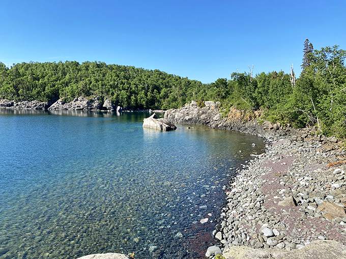 Lighthouse goals! Perched on a cliff like a sentinel guarding Lake Superior, it's the stuff of postcards and daydreams. Photo credit: Jonpaul Okal