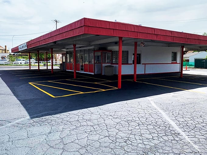 Andy's parking lot: Where every car becomes a private dining room and every meal is a trip down memory lane. No DeLorean required!