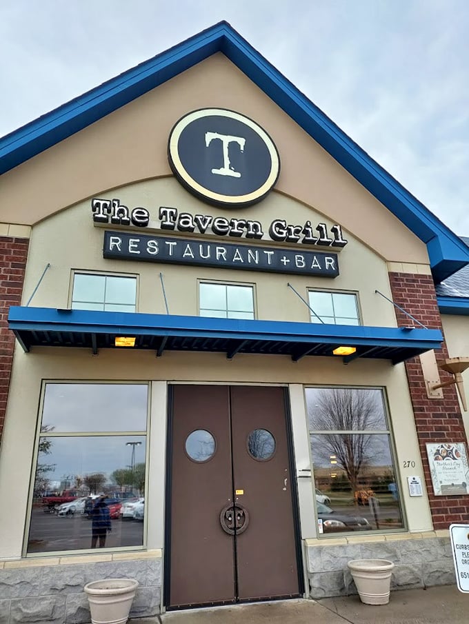 Where patio dreams come true! The Tavern Grill's inviting exterior is just the appetizer to your culinary adventure. Photo credit: Dilip Tiwari