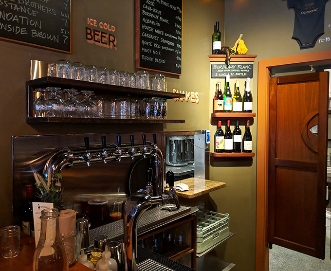 The bar at Duckfat: where beer taps flow like poetry and the bottles stand at attention, ready to make your acquaintance. Cheers to good times!