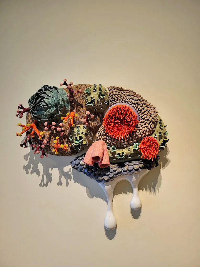 Who says coral reefs are only found underwater? This vibrant sculpture brings the ocean's wonders to eye level, no snorkel needed.