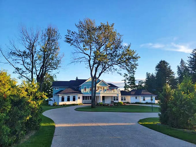 Who needs a white picket fence when you've got a circular driveway fit for royalty? This home is giving serious "cottage core" vibes.