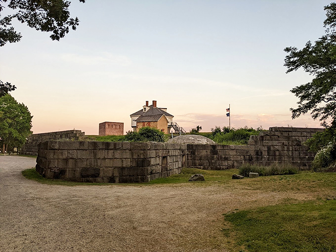 History's golden hour: As the sun sets, Fort McClary's silhouette stands proud against the sky, a timeless sentinel on Maine's coast.