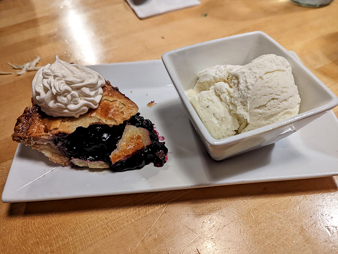 Blueberry pie &agrave; la mode - where warm, juicy berries meet cool, creamy vanilla in perfect harmony. 