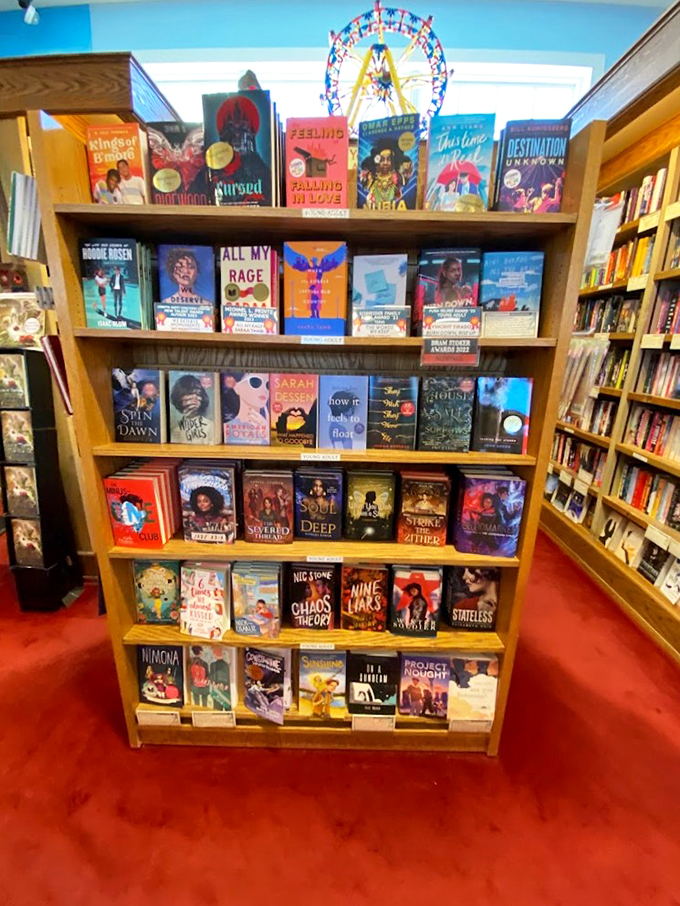 Floor-to-ceiling shelves create a cozy nook where bookworms can get happily lost in endless rows of possibilities.