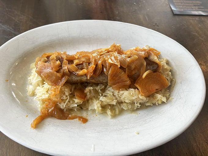 Sweet meets tangy! These caramelized onions and sauerkraut turn a simple brat into a flavor explosion.