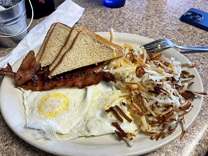The breakfast combo that dreams are made of. Eggs, bacon, hash browns, and toast &ndash; it's like the Avengers of breakfast foods, assembled on one glorious plate. Photo credit: Ms. Ma&rsquo;am Garcia