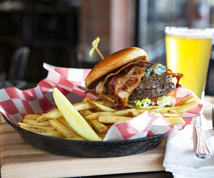 This burger means business: thick patty, crispy bacon, and enough presence to hold its own against the lobster roll.