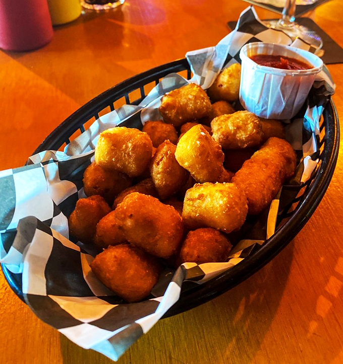 Golden-brown cheese curds that would make Wisconsin proud, served with a side of Maine hospitality.