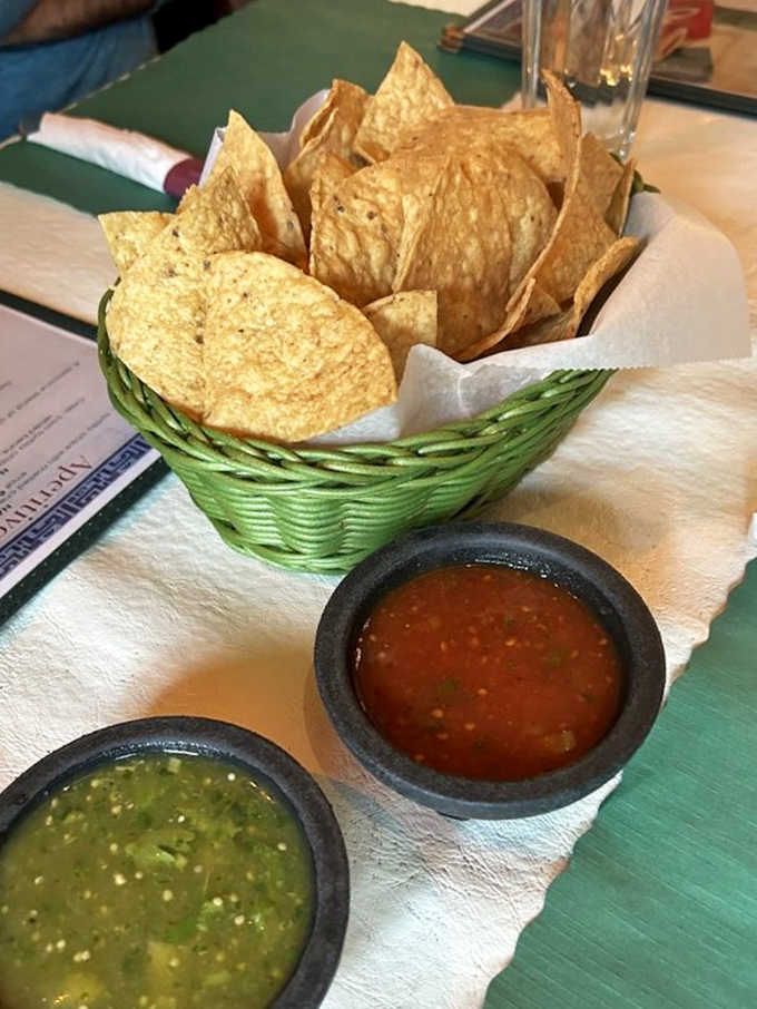 Crispy, house-made tortilla chips with two personalities of salsa - one cool and green, one bold and red.