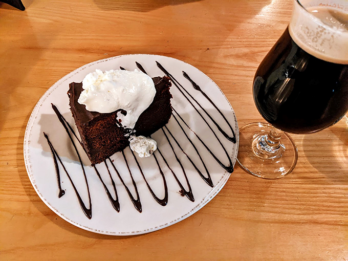 A slice of chocolate heaven with whipped cream clouds - dessert doesn't get more heavenly than this.