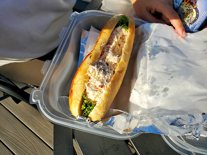 Fresh Maine crab nestled in a toasted roll - simplicity that speaks volumes about Maine's seafood mastery.