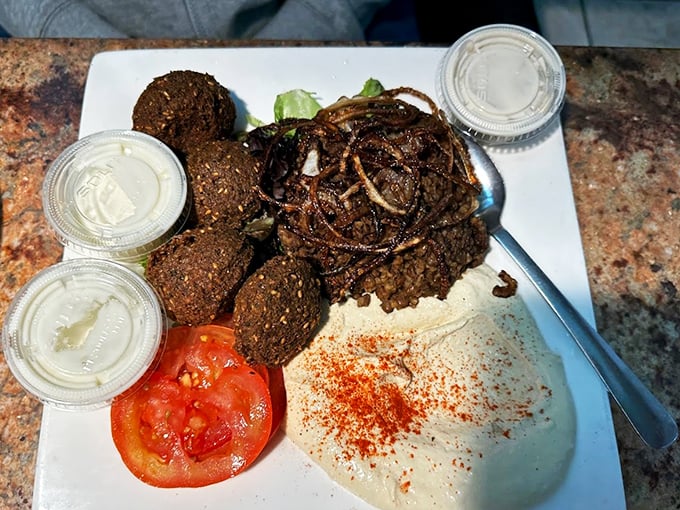 Falafel meets hummus in this classic combination, with pickled turnips adding their signature magenta pop to the plate.