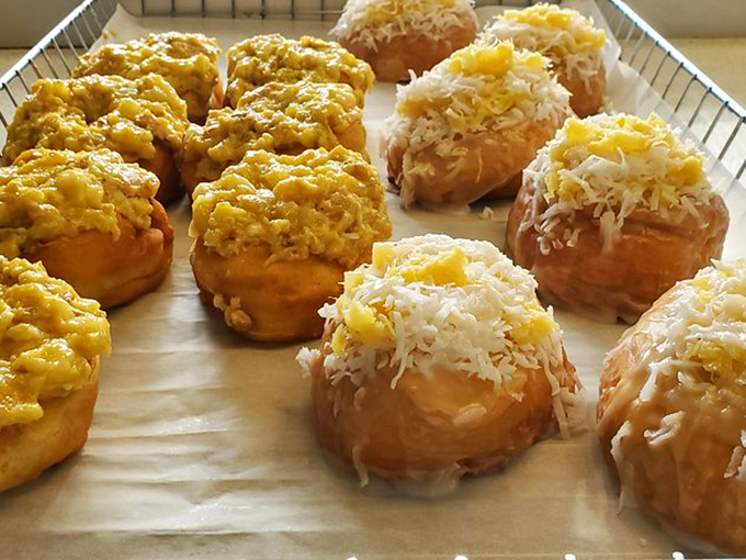 Coconut and custard creations that look like they just stepped off a tropical vacation and into the display case.