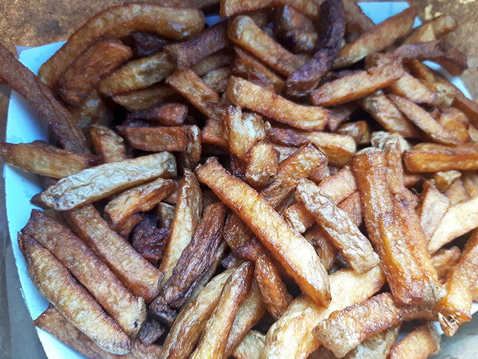 These hand-cut fries are the supporting actors that steal the show - crispy, golden, and ready for their spotlight.