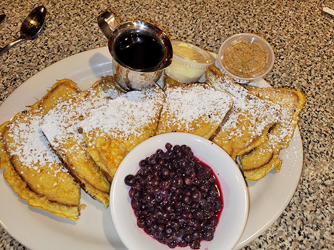 French toast that's dressed for success, with powdered sugar snow and a side of blueberries that pop with flavor. Photo credit: Amelia Green
