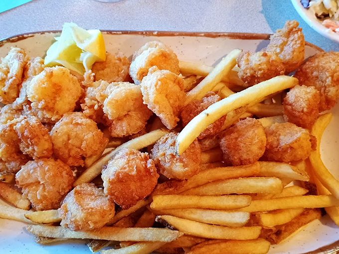 These crispy fried shrimp are like little nuggets of seaside gold, perfectly paired with golden fries.