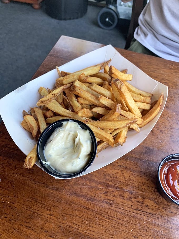 These aren't just fries &ndash; they're golden potato perfection, hand-cut and served with creamy house-made aioli. Photo credit: Emily B.