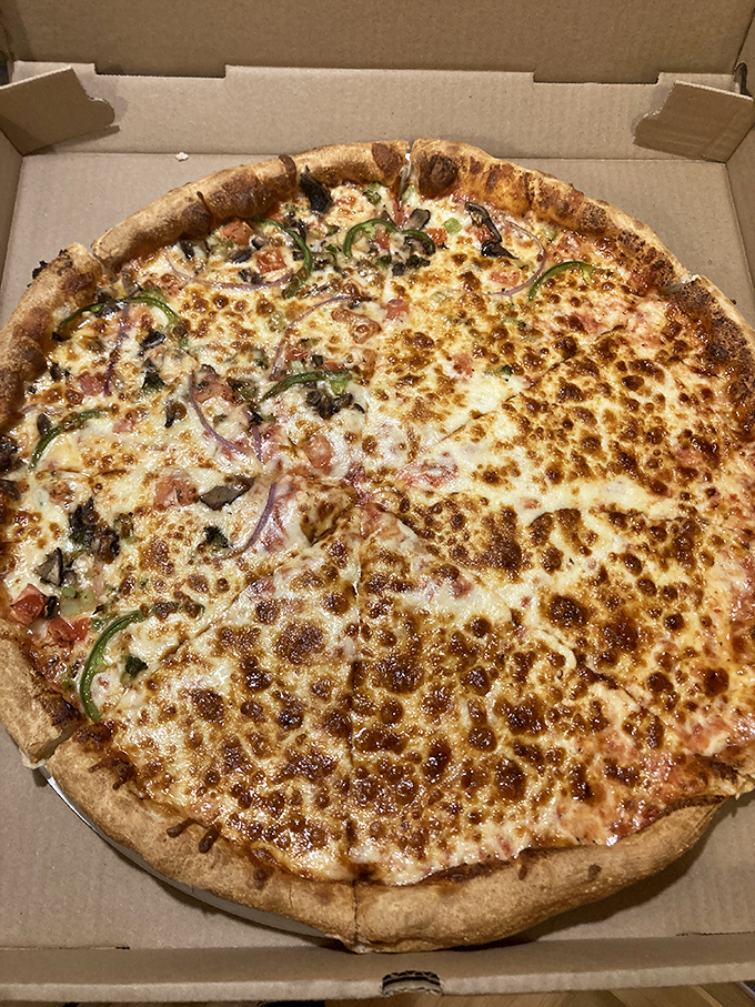 Can't decide between cheese and veggies? Have your cake (or pizza) and eat it too with this half-and-half masterpiece.