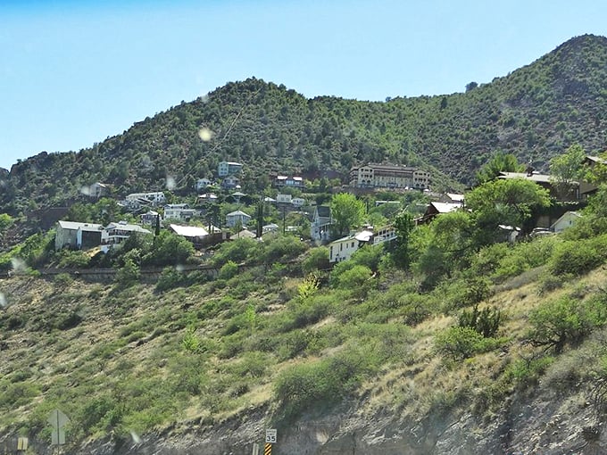 Jerome's historic homes cling to the mountainside like barnacles on a ship, defying gravity with stubborn charm.
