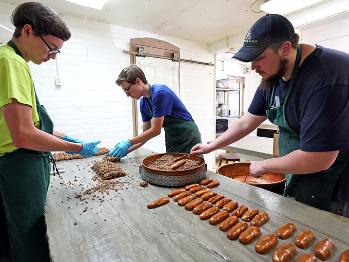 Behind the scenes of sweetness! These kitchen wizards are crafting edible magic. It's like watching the Avengers, but with more sugar.