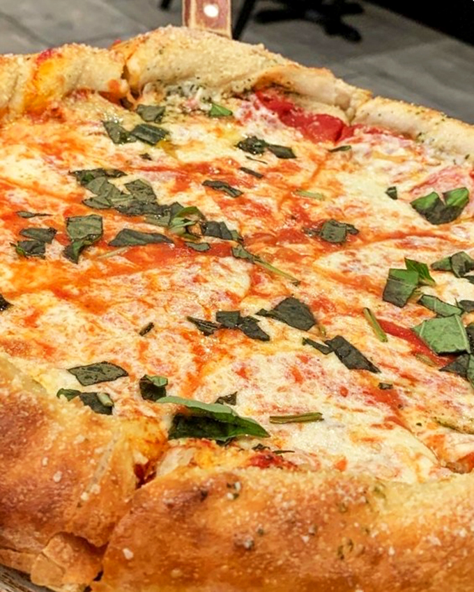 A pizza so fresh and colorful, it looks like it just stepped off a plane from Naples.