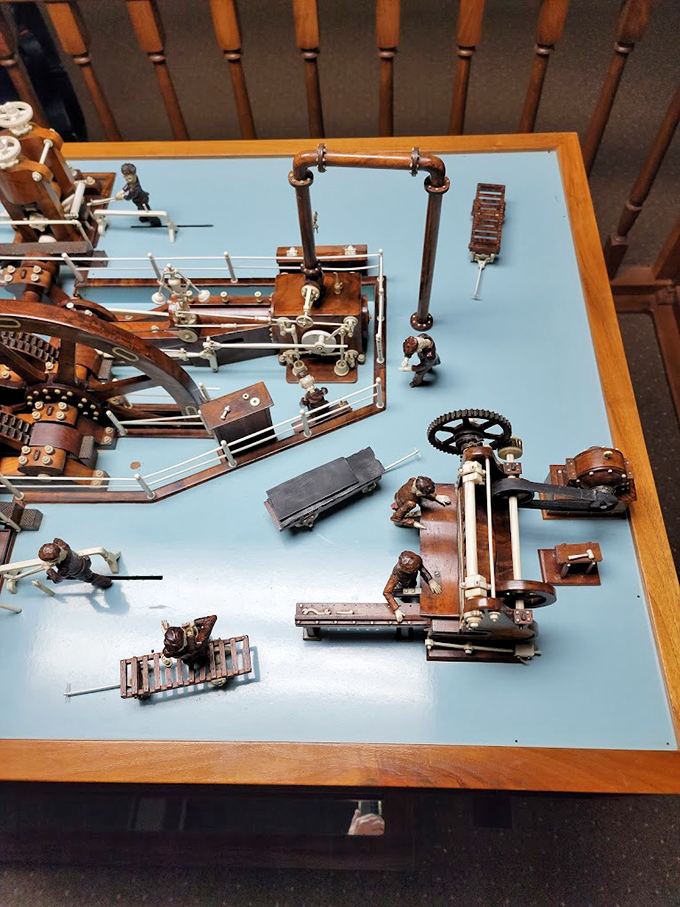 It's a small world after all! This tiny tableau brings the bustling world of steam engines to life, no magnifying glass required.