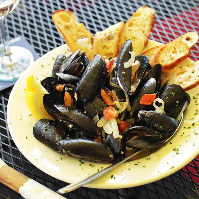 These mussels aren't just steamed, they're pampered: Served with grilled bread that's perfect for soaking up every drop of that heavenly broth. Photo credit: Archer's on the Pier
