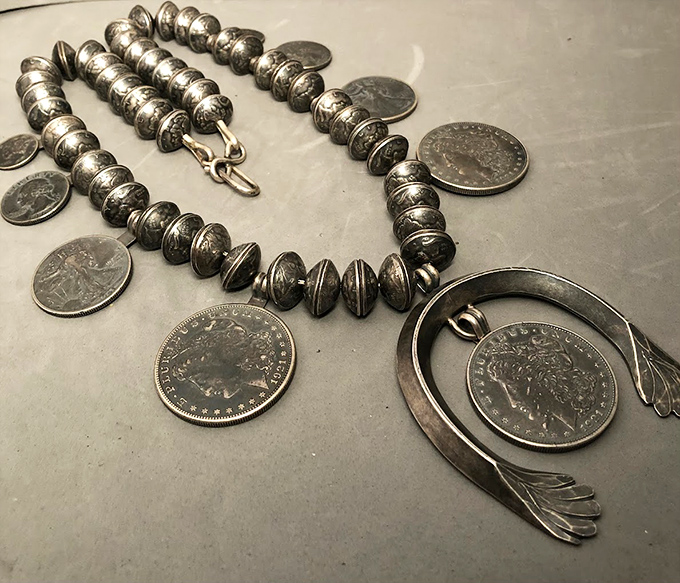 Silver storytellers: This necklace isn't just jewelry, it's a piece of the Old West. Each bead and coin has a tale to tell.