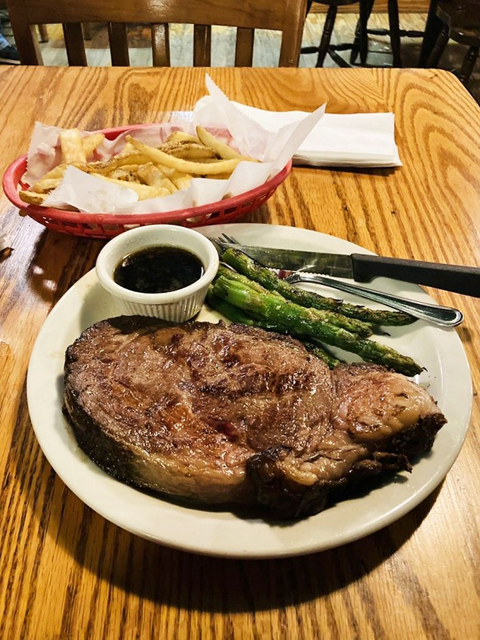 A steak that means business, served with asparagus that actually makes vegetables exciting.