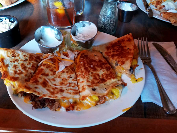 Golden-brown tortillas hiding a treasure trove of melted cheese and fillings - proof that comfort food knows no borders.