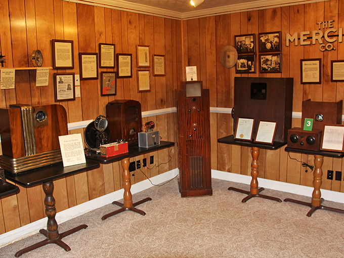 From radio stars to TV icons, this display showcases the evolution of home entertainment. It's like a family tree of media, with rabbit ears as the branches.