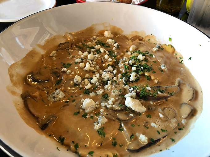 Mushrooms and blue cheese create a savory masterpiece that proves sometimes the best art is meant to be eaten.