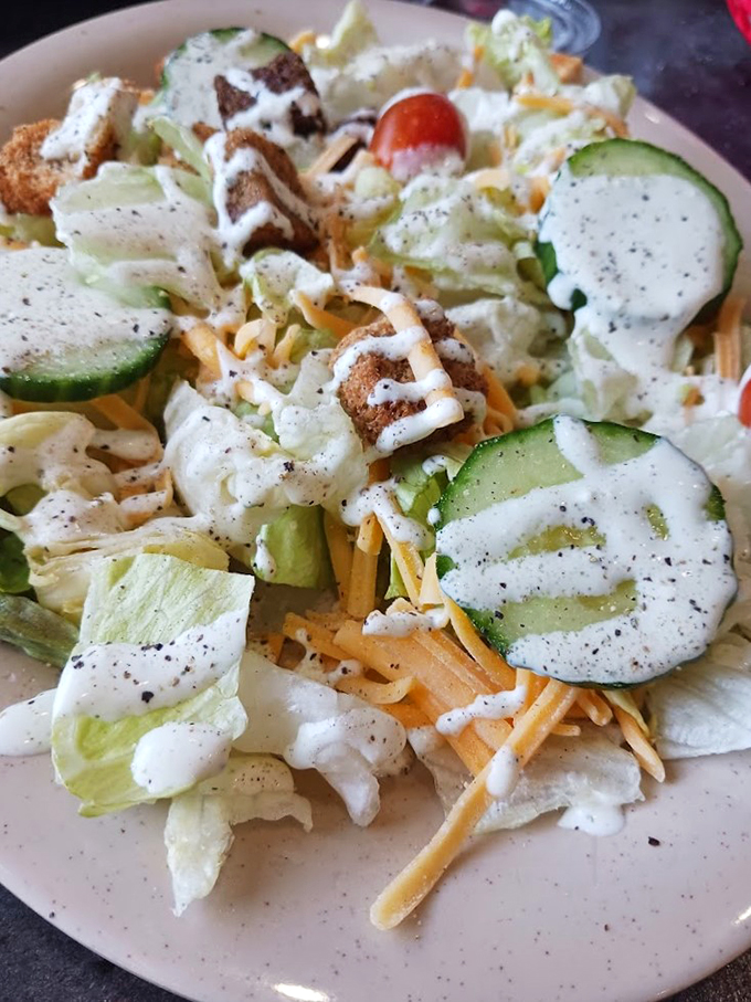 A nod to your conscience! This crisp salad provides a brief intermission in the meat symphony, with a creamy encore.