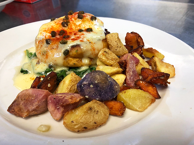 Eggs Benedict's cooler cousin has arrived! This salmon cake version is making waves in the brunch scene.