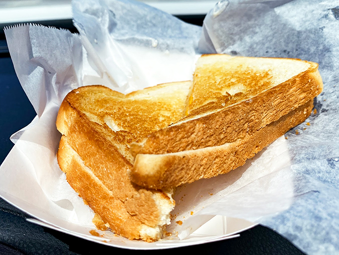 Golden-brown perfection: A sandwich that makes you appreciate the art of proper grilling and quality ingredients. Photo credit: Claire J