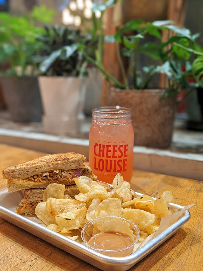 A sandwich, chips, and signature drink create the holy trinity of lunch perfection at Cheese Louise. Photo credit: Tand Herrera