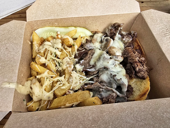 Sandwich perfection meets crispy potato heaven. It's like a hug for your taste buds, if hugs were made of beef and cheese.