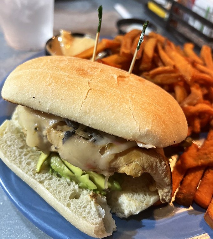 A hearty sandwich paired with sweet potato fries proves this place isn't just about dessert. 