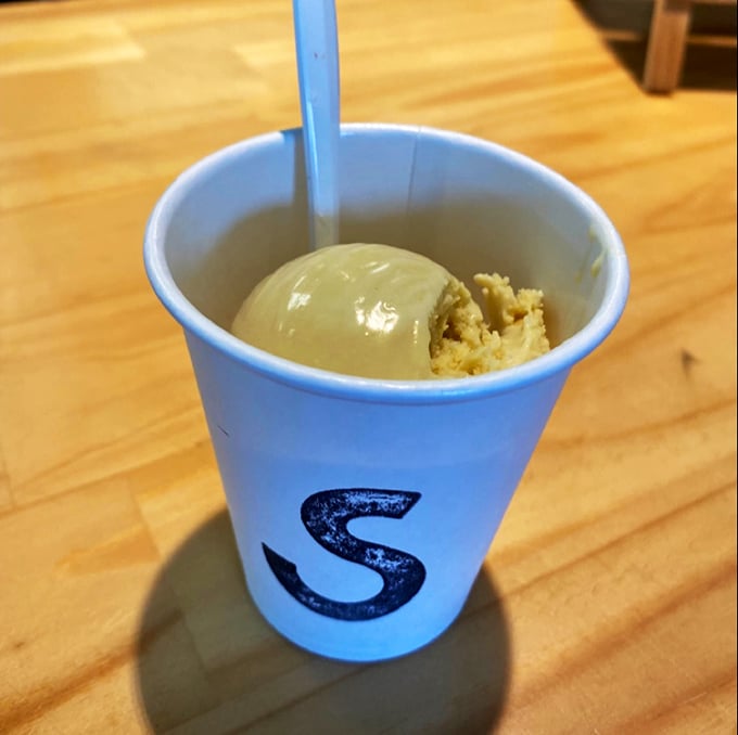 One scoop of sea salt ice cream in Scout's signature blue cup - where sweet meets salty in perfect harmony.