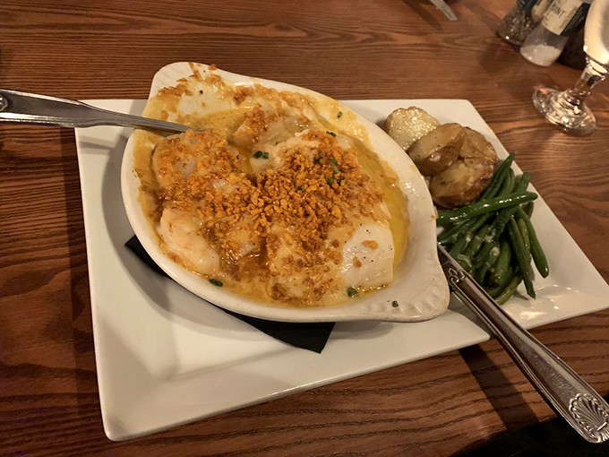 A golden-topped treasure chest of seafood goodness that makes you want to dive right in.