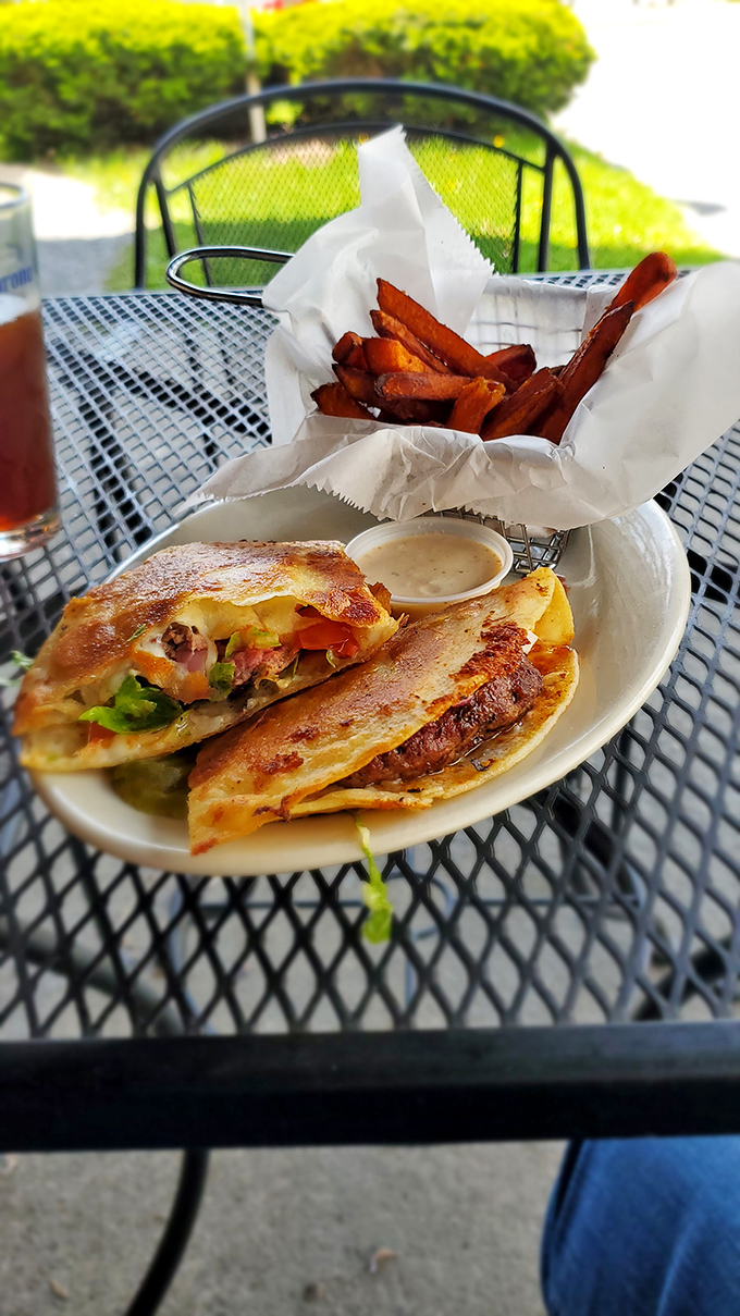 Warning: This burger may cause spontaneous drooling. It's so cheesy, it could star in its own rom-com!