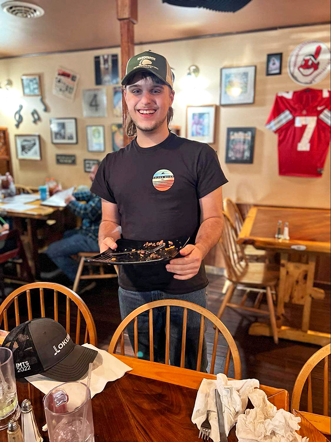 Service with a smile! This friendly face is ready to guide you through your BBQ adventure.