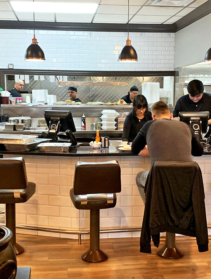 Behind the scenes magic! The kitchen crew works their culinary wizardry, turning ingredients into edible works of art.