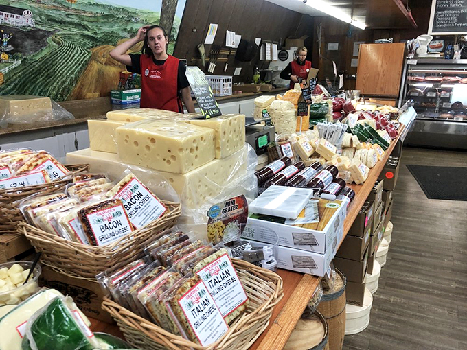 Cheese whizzes at work! The friendly staff stands ready to guide you through a world of dairy delights. Their knowledge is as sharp as the cheddar they're slicing.
