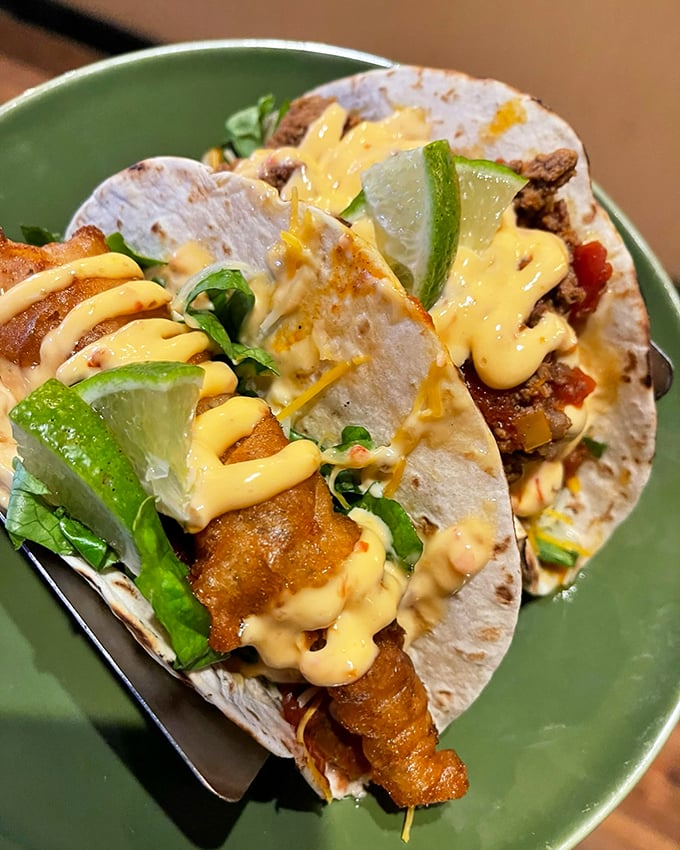 These tacos aren't just filled - they're loaded with personality and dressed to impress with that signature sauce.